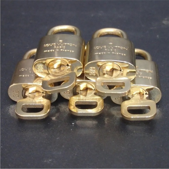 Louis Vuitton | Accessories | Lv Lock Key | Poshmark